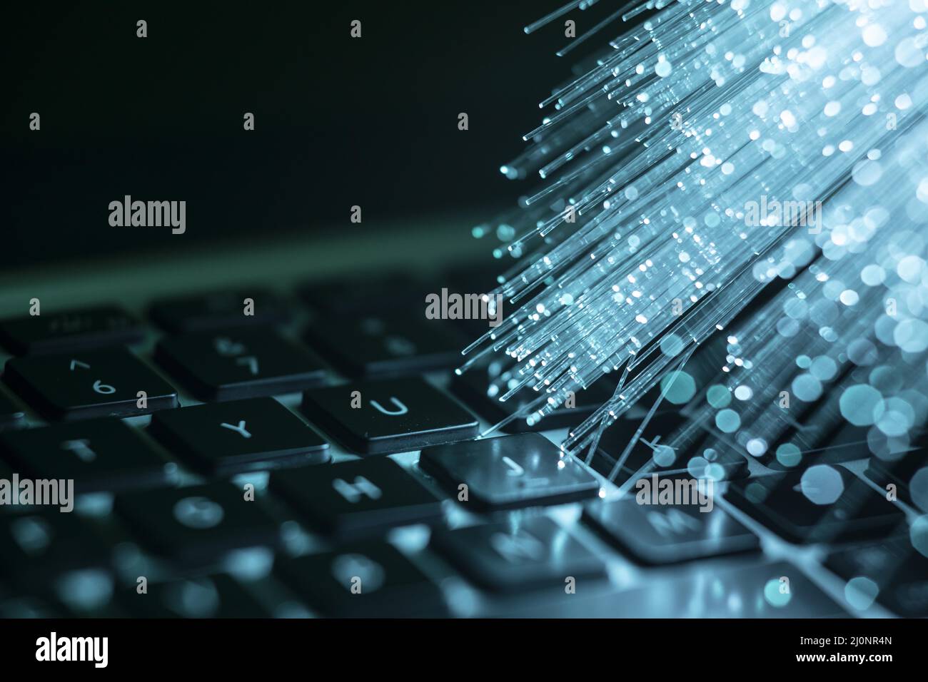 Laptop with blue optical fiber . High quality and resolution beautiful ...