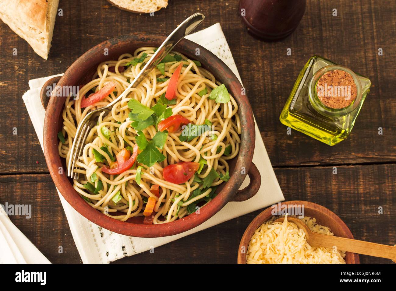 Tomatoes coriander toppings spaghetti pasta earthenware. High quality ...