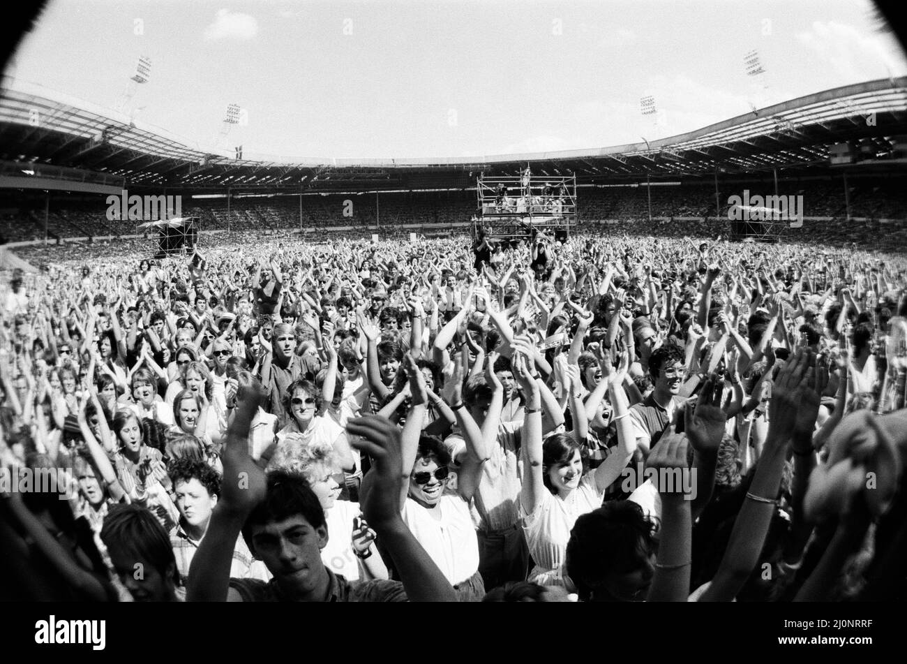 Fans at the "Summer of 84" concert at Wembley Stadium, which featured ...