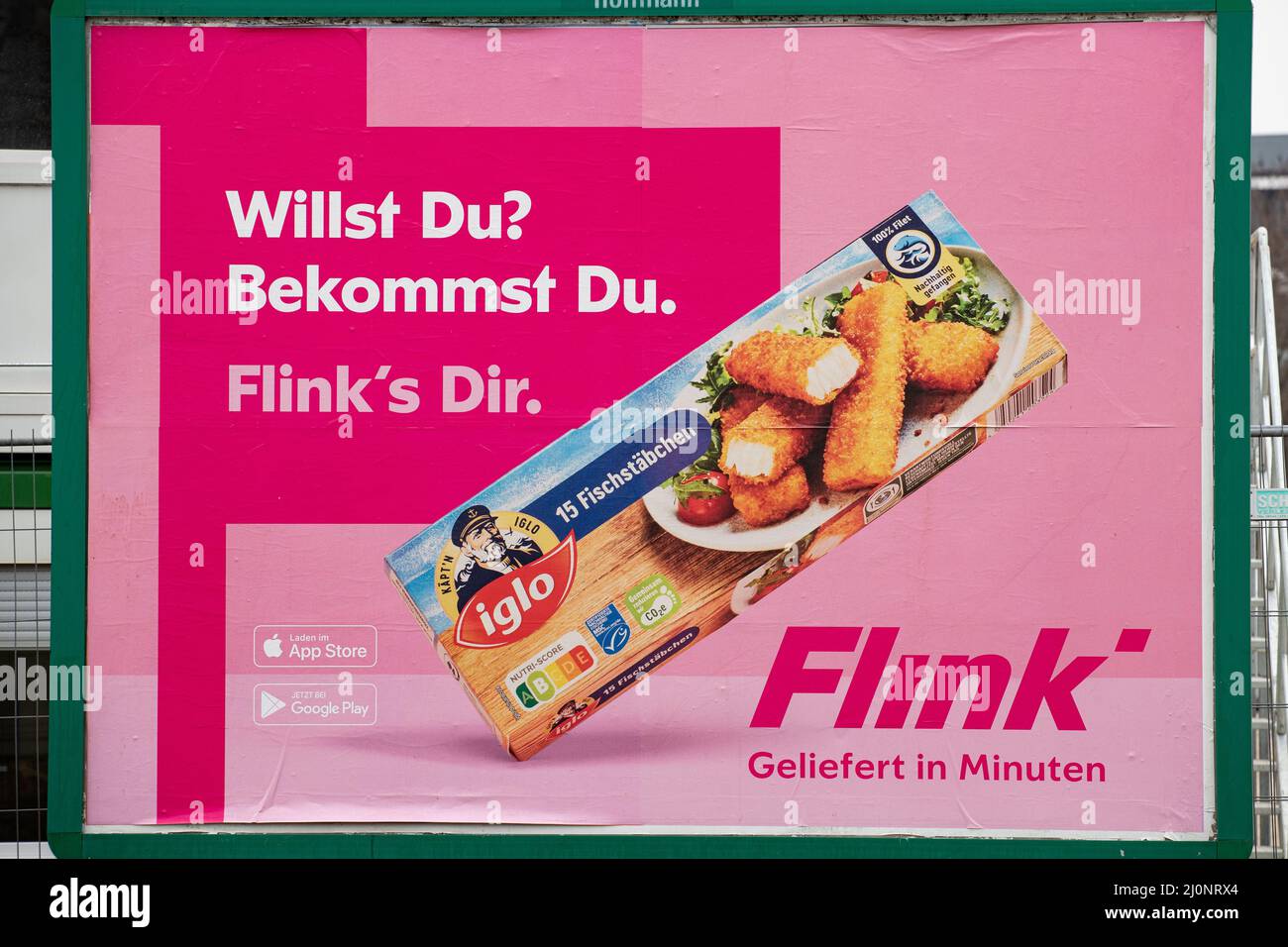 A billboard of the delivery service of Flink with fish sticks of ...