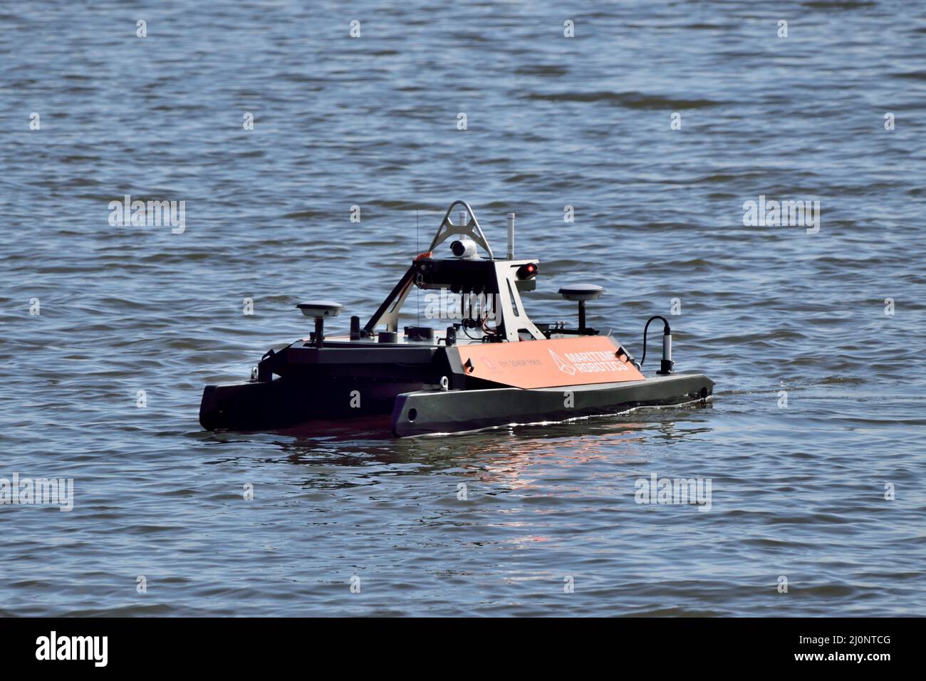 Maritime Robotics Otter Pro Uncrewed Surface Vessel (USV) operating in ...