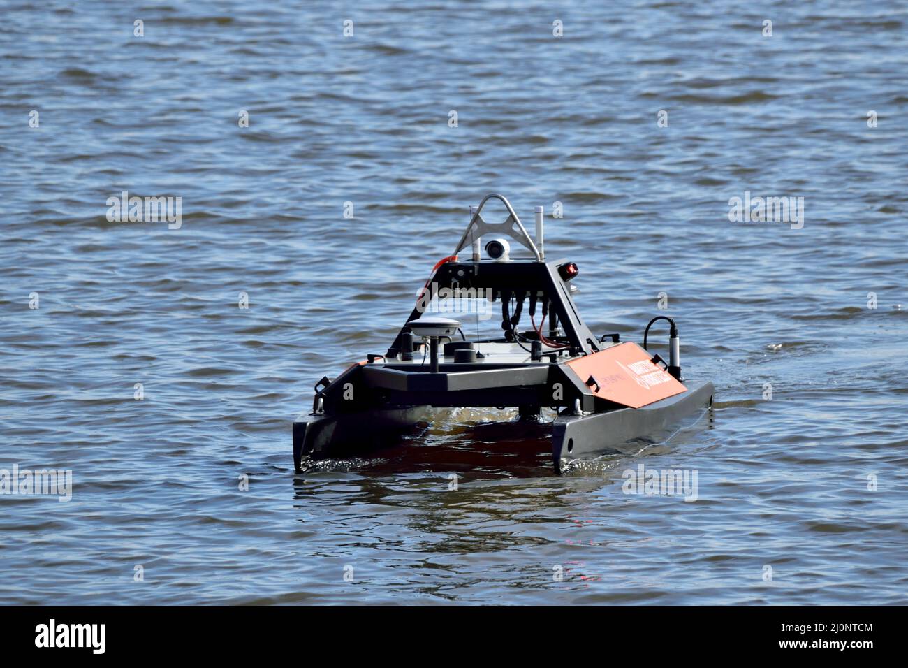 Maritime Robotics Otter Pro Uncrewed Surface Vessel (USV) operating in ...