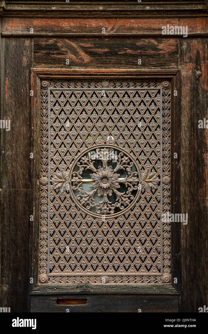 Ornate old wood front doors Stock Photo - Alamy