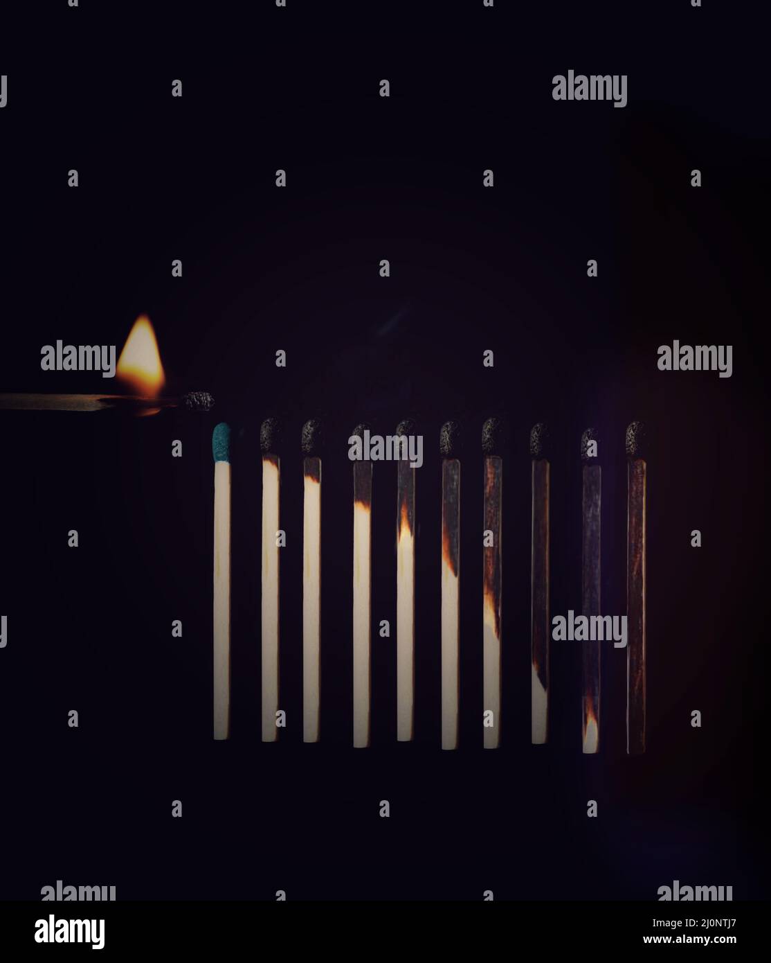 Match stick burning. Match stick in black background. Different stages ...