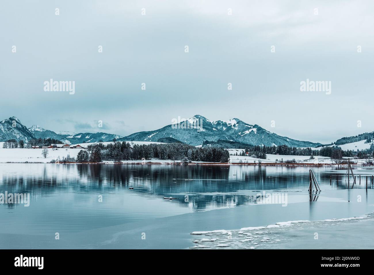 The Hopfensee with the AllgÃ¤u Alps in winter. Germany Stock Photo - Alamy