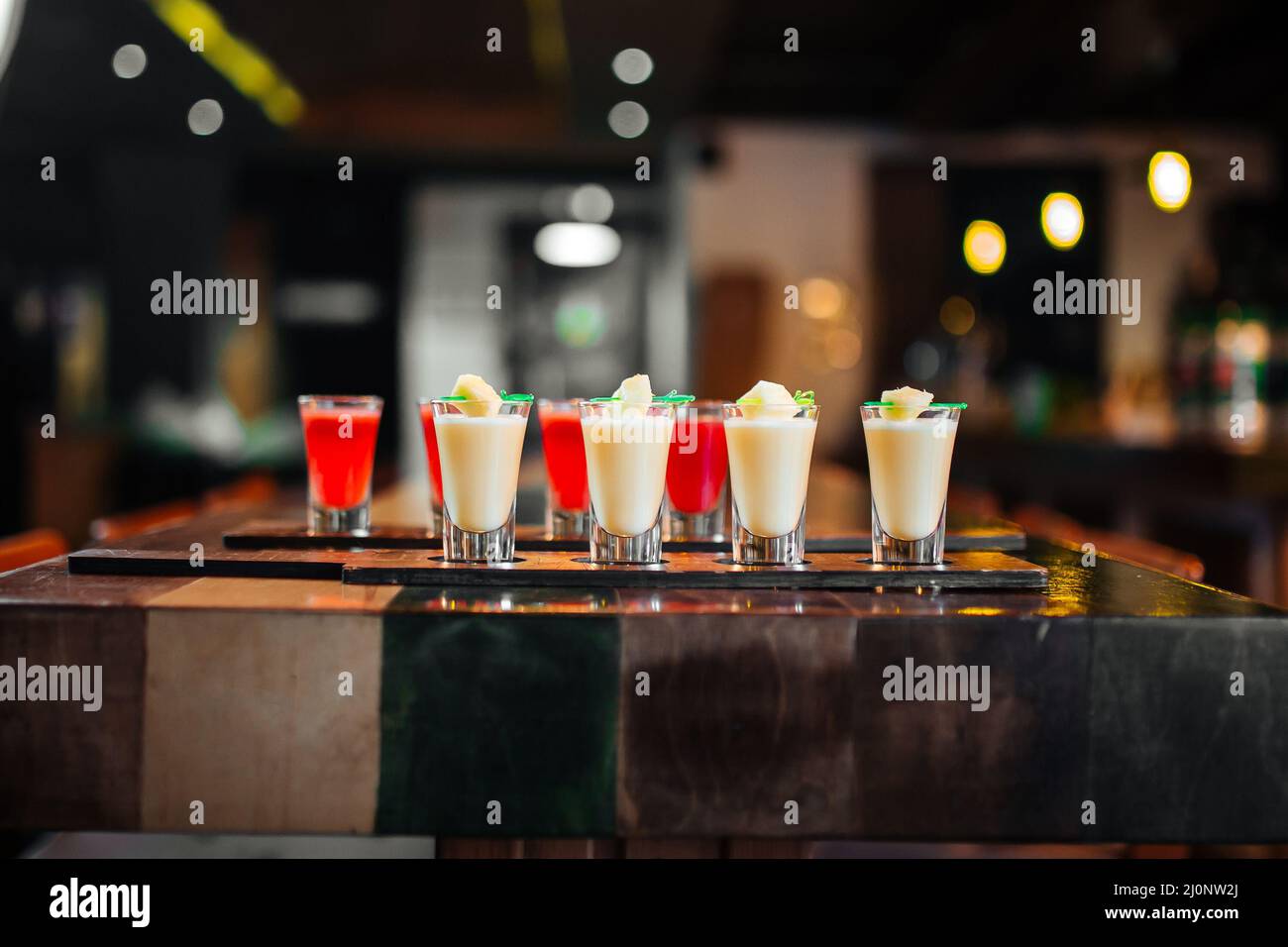Sweet alcohol liqueur cocktail shots Stock Photo - Alamy