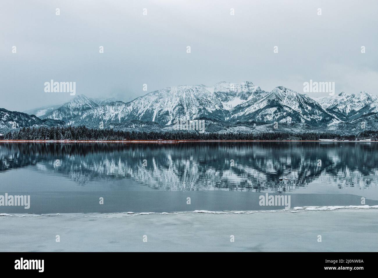 The Hopfensee with the AllgÃ¤u Alps in winter. Germany Stock Photo - Alamy