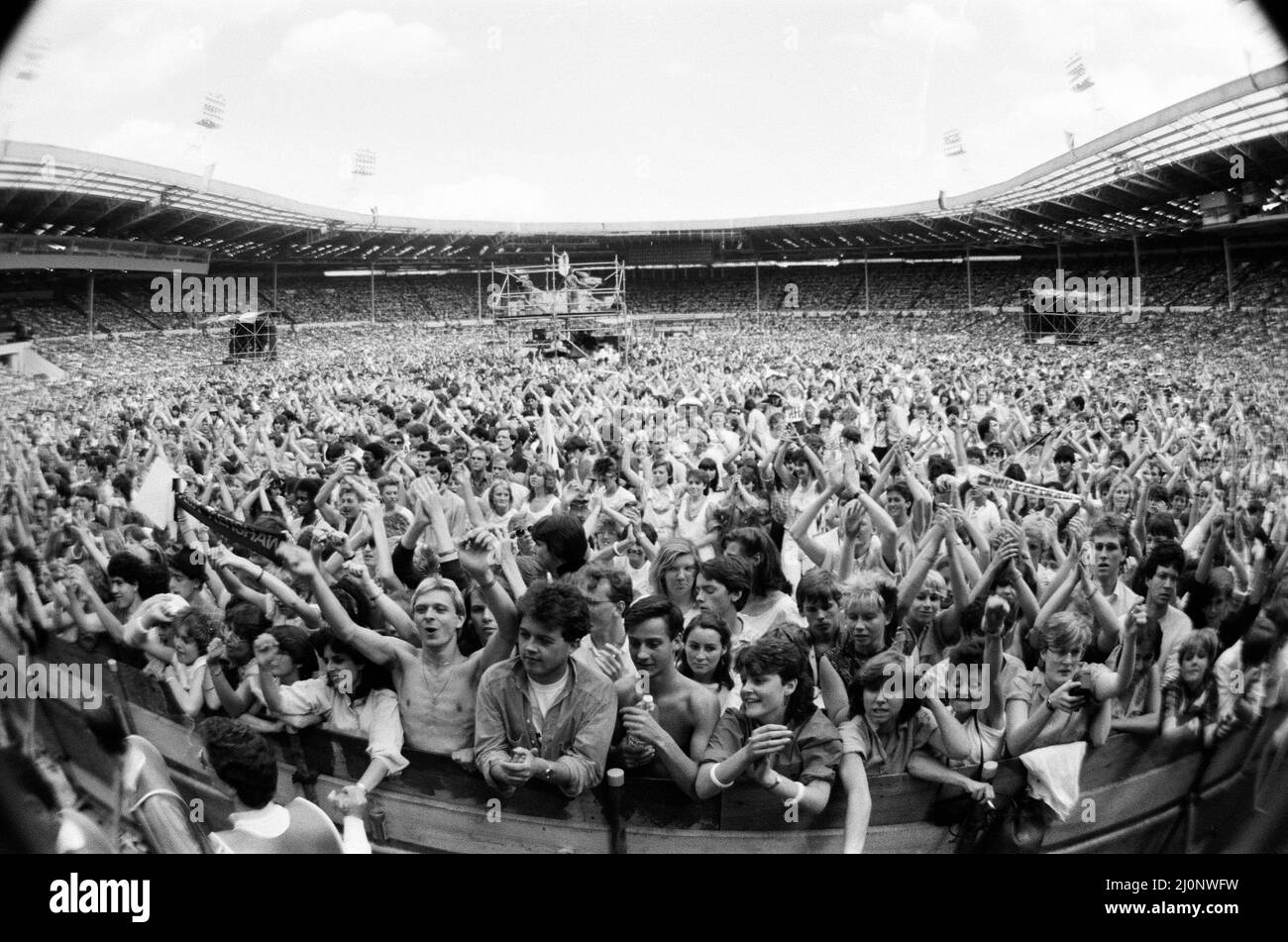 Fans at the "Summer of 84" concert at Wembley Stadium, which featured ...