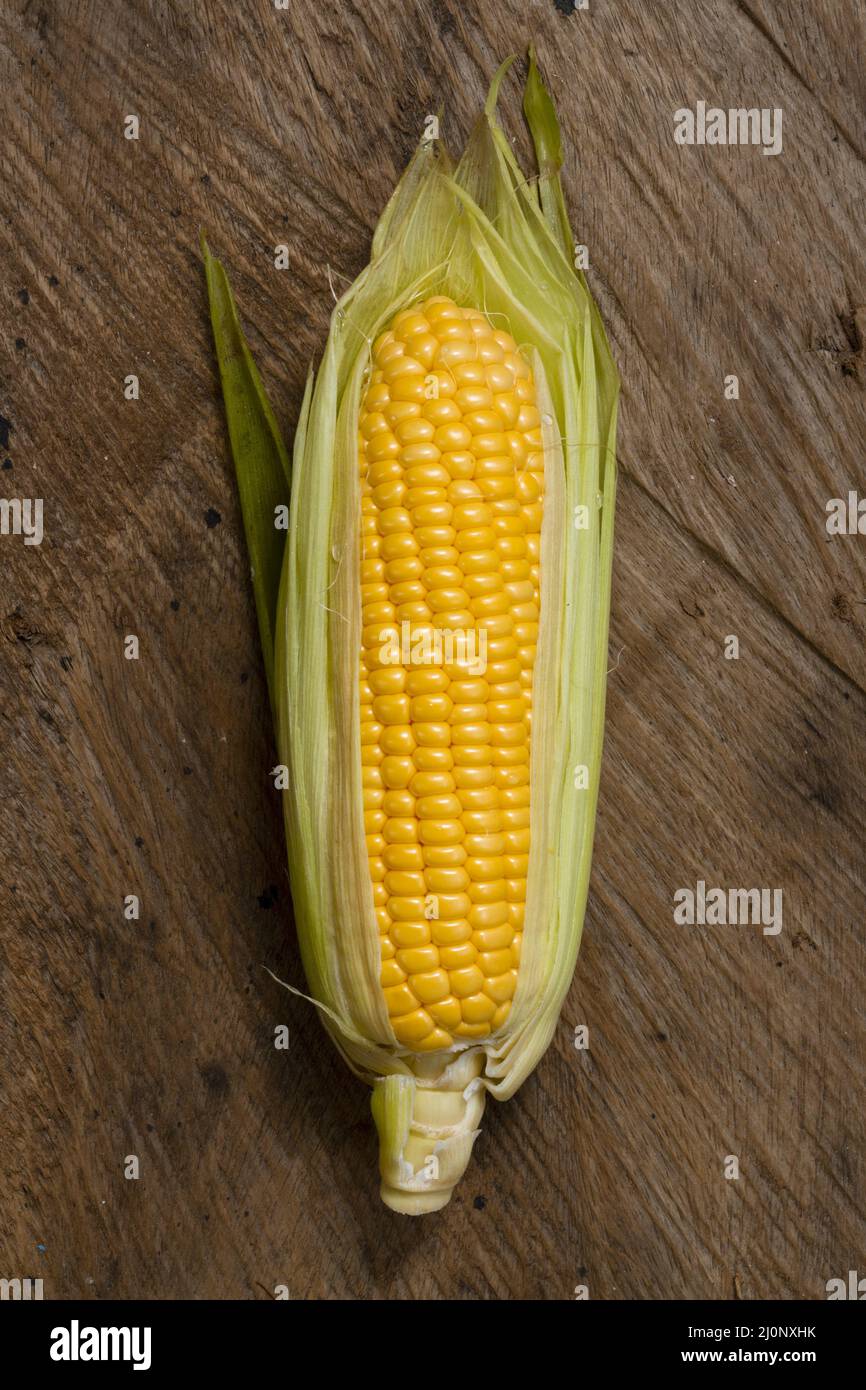 Top view corn with wooden background. High quality and resolution ...