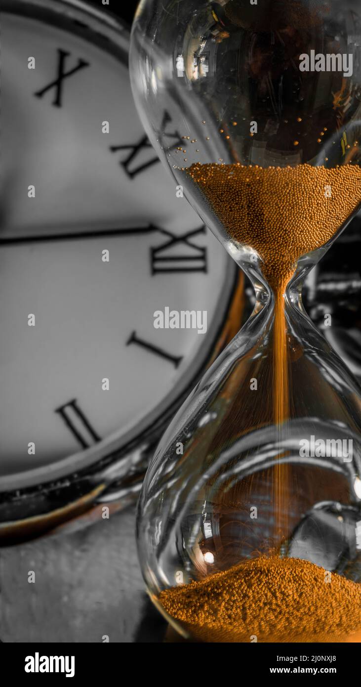 Burning hourglass hi-res stock photography and images - Alamy