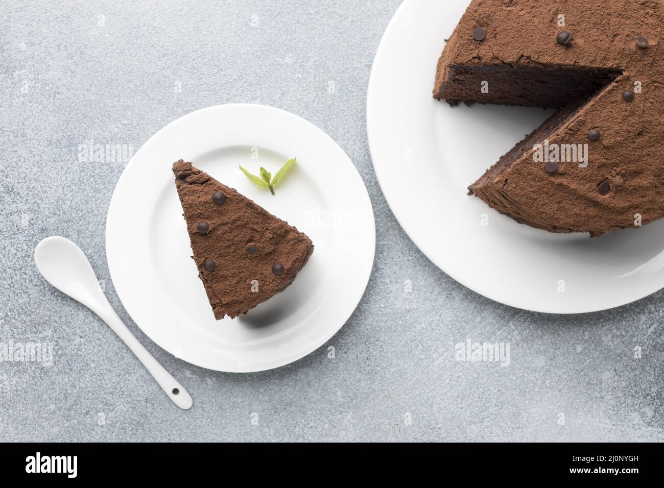 Top view chocolate cake slice with spoon mint. High quality and ...