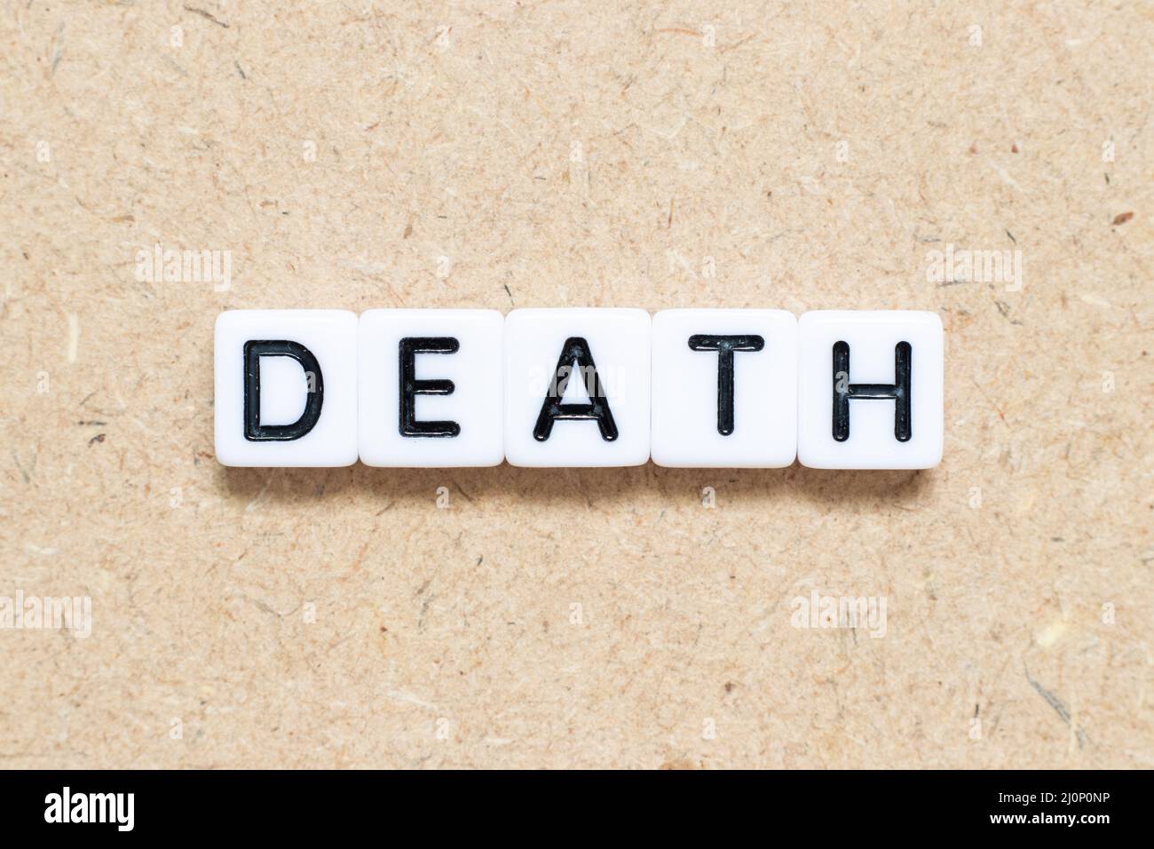 White tile alphabet letter with word death on wood background Stock ...