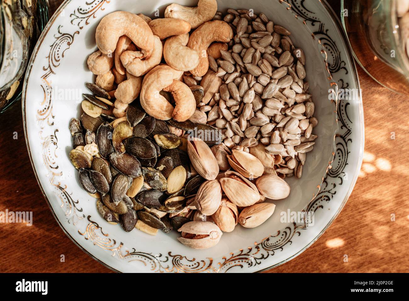 Cashew nuts, pistachios, sunflower seeds and pumpkin seeds in a ...