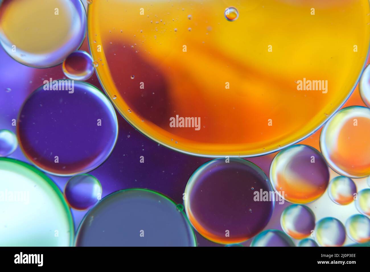 abstract photo of oil drops float on a water Stock Photo - Alamy