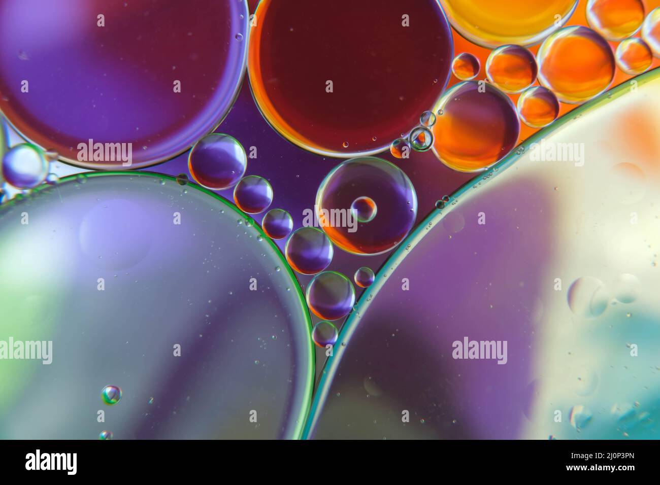 abstract photo of oil drops float on a water Stock Photo - Alamy