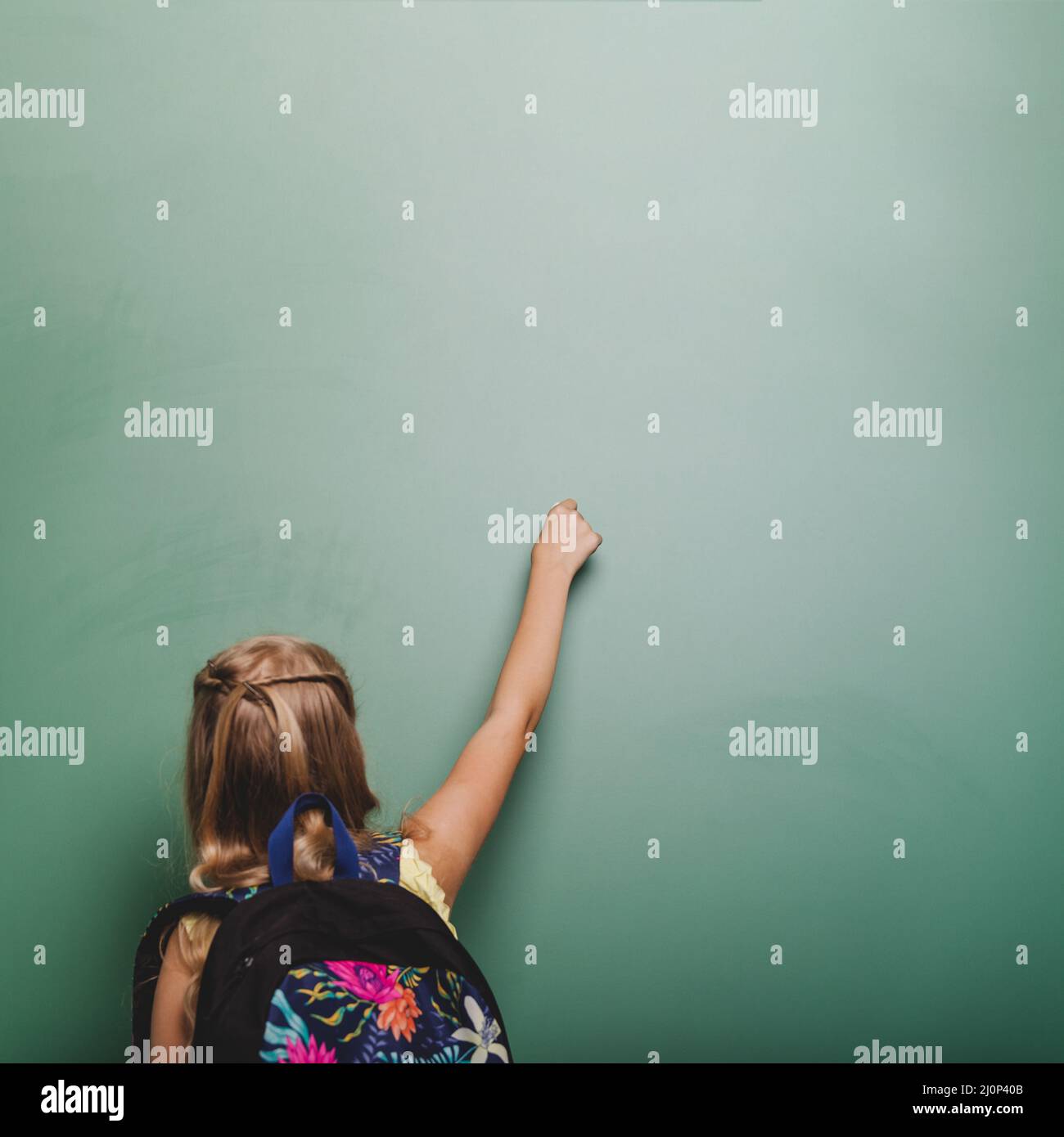 Pupil girl writing blackboard. High quality and resolution beautiful ...