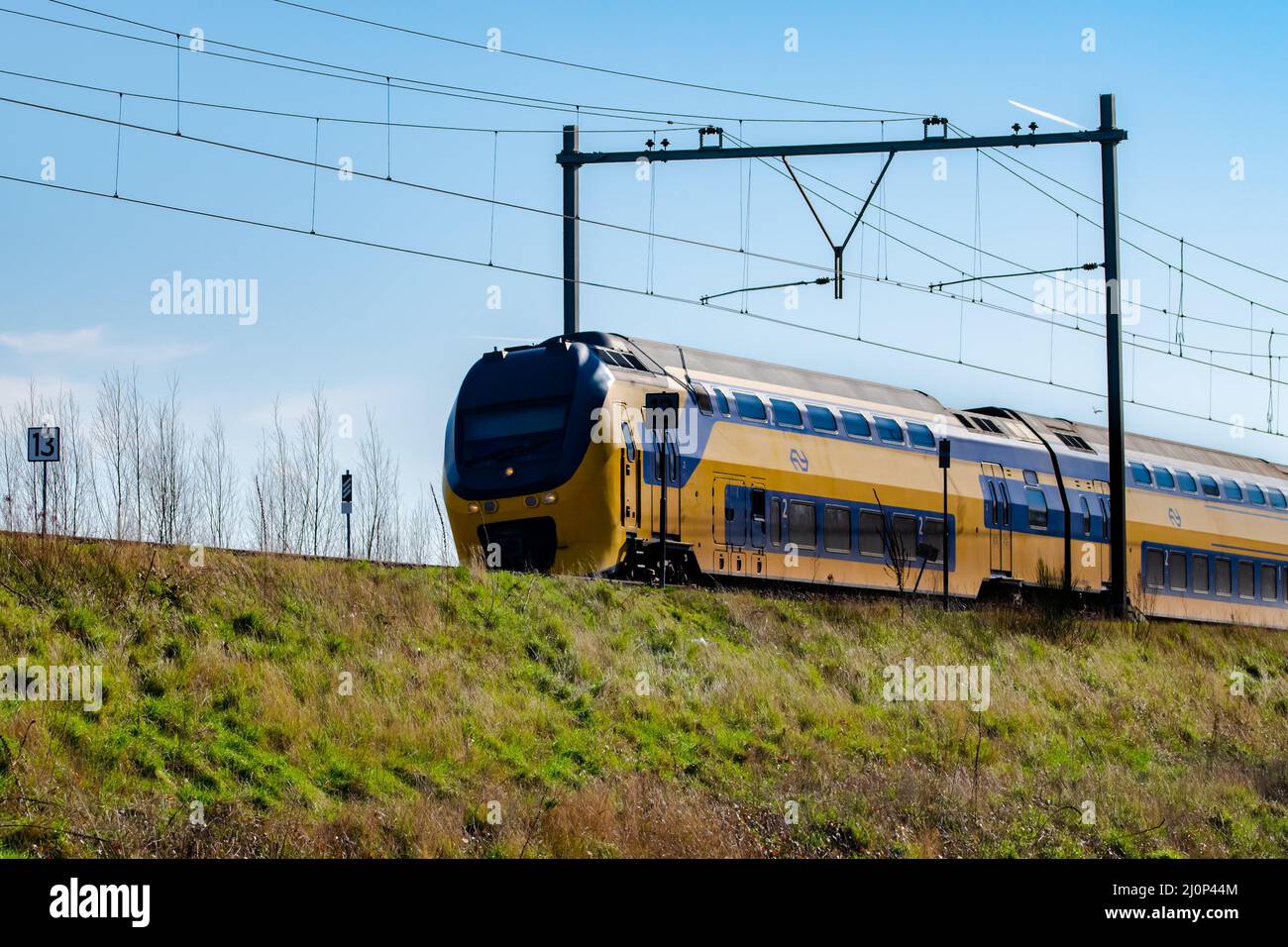 National train on the train tracks in the Netherlands Stock Photo - Alamy