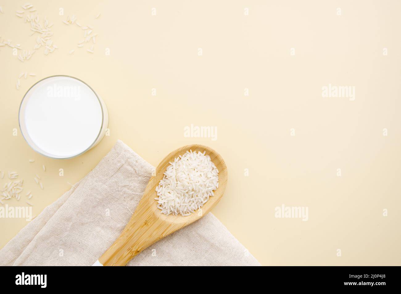 Top view rise spoon with milk copy space. High quality and resolution ...