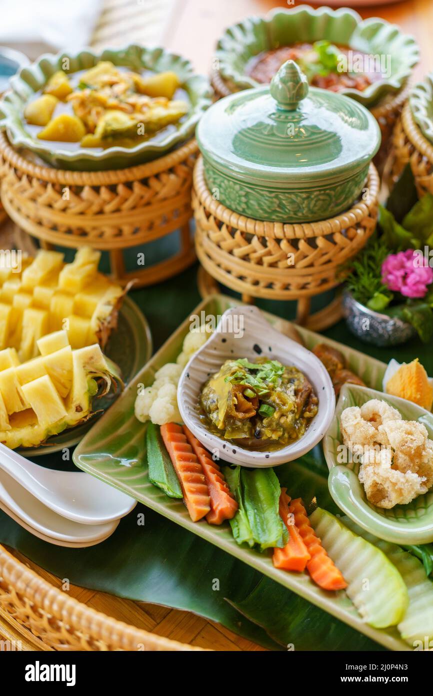 Local Tradition Northern Thai style food "Kan Tok". Mix Thai cuisine ...