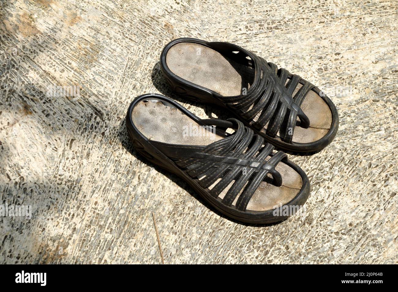 Worn out sandals hi-res stock photography and images - Alamy