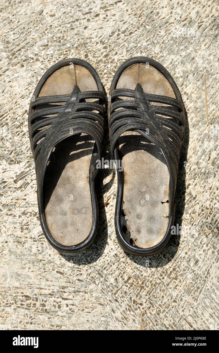 Worn out sandals hi-res stock photography and images - Alamy