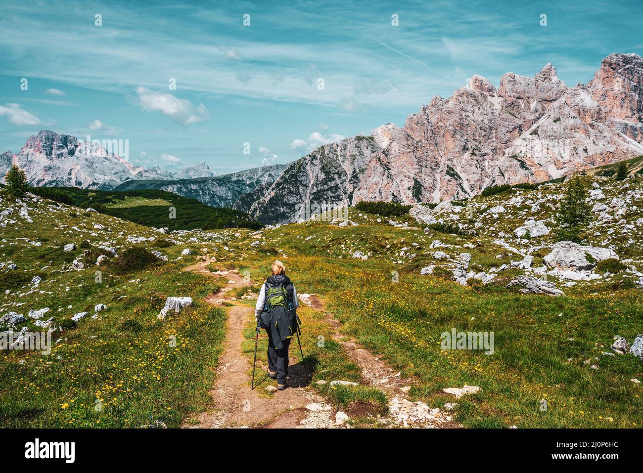 Backpacker hiking on footpath in hi-res stock photography and images ...