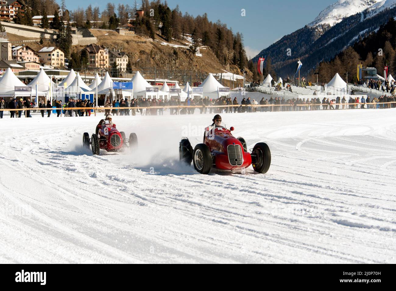 Classic vintage antique sports cars racing on the frozen lake of St ...