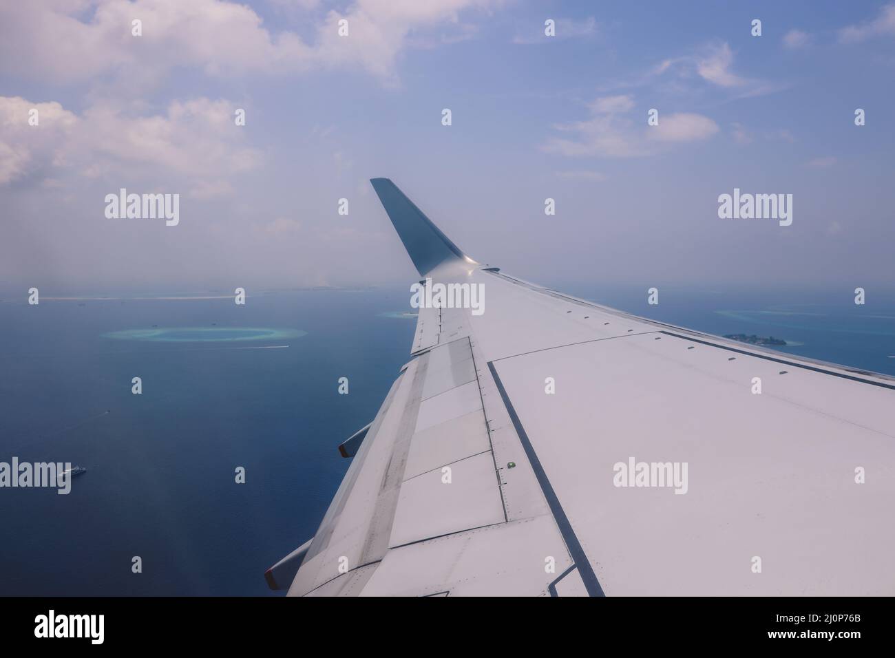 Aerial View from Aircraft Window to the Male Island among the Blue ...