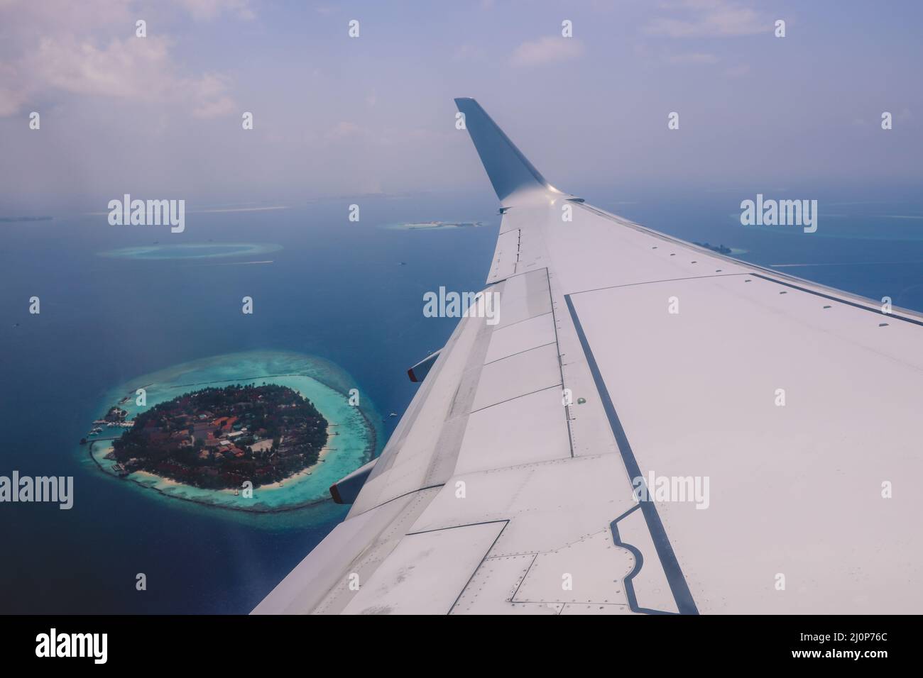 Aerial View from Aircraft Window to the Male Island among the Blue ...