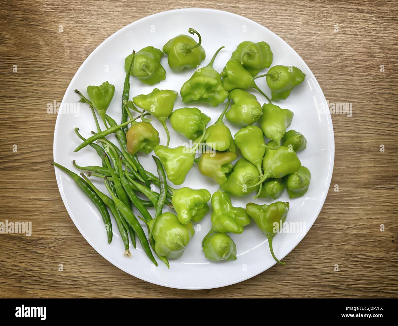 Plate peppers hi-res stock photography and images - Alamy