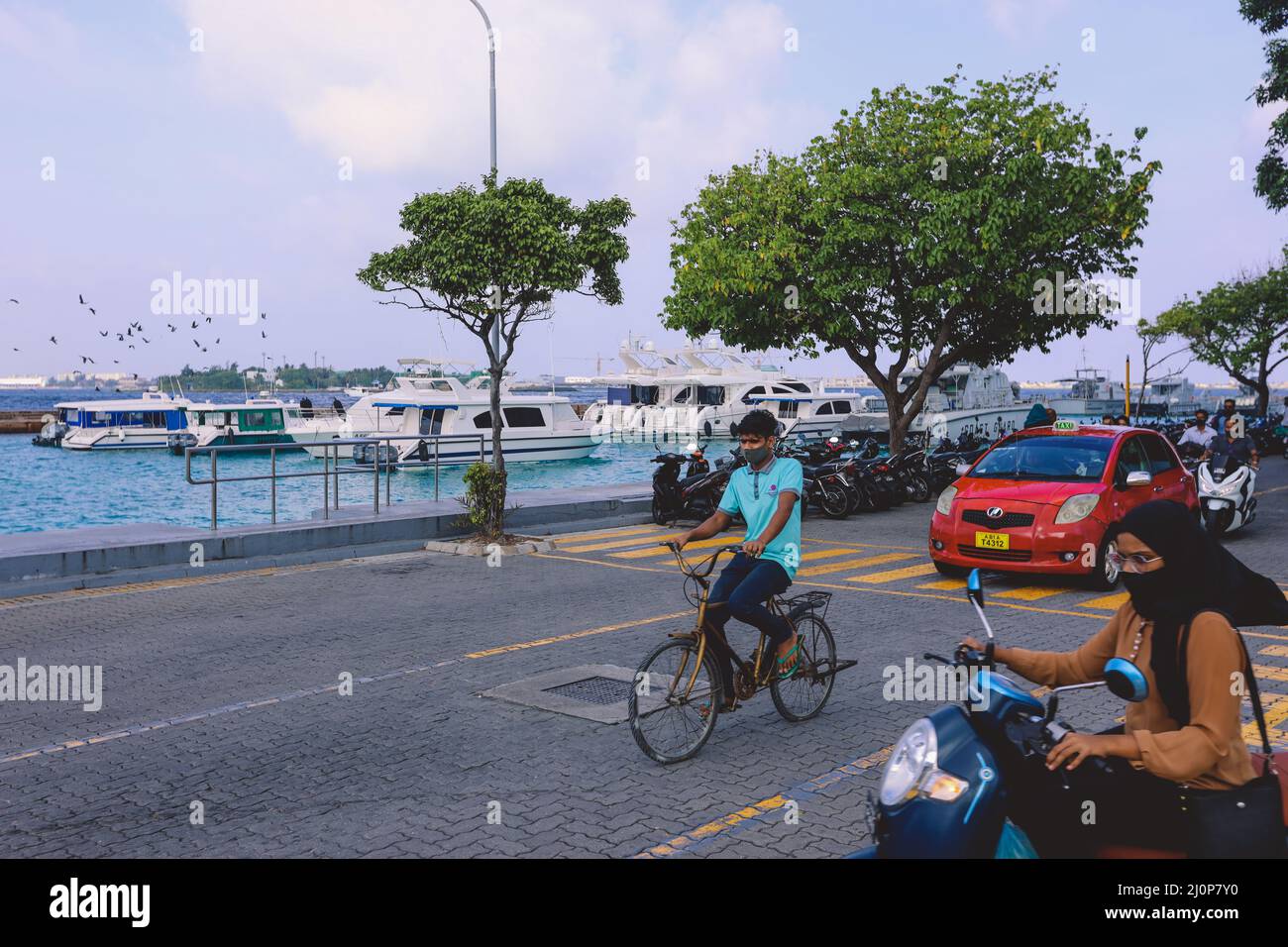 Male maldives street hi-res stock photography and images - Alamy