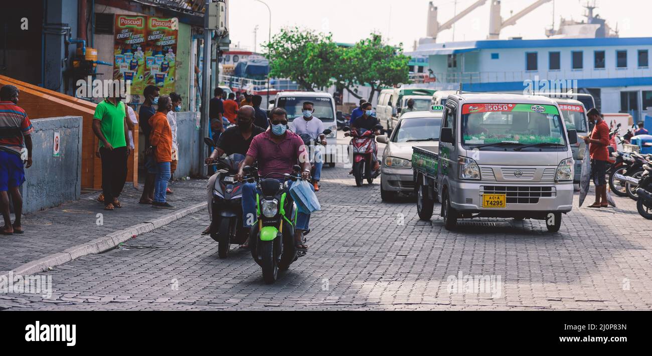 Maldivian Local People riding on the Bikes on the Male City streets ...