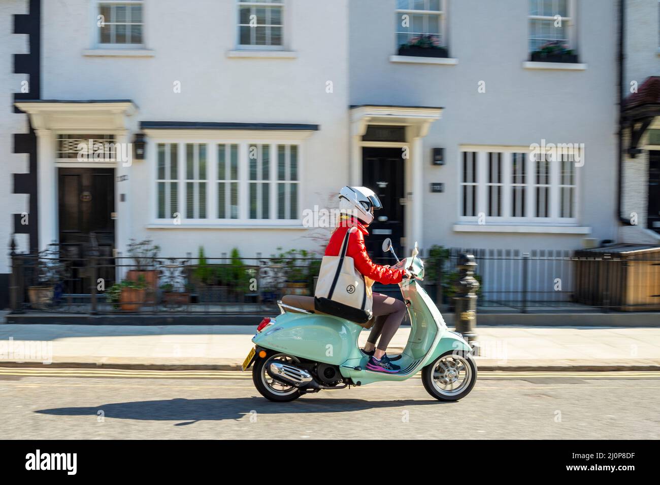 Female motor scooter rider hi-res stock photography and images - Alamy