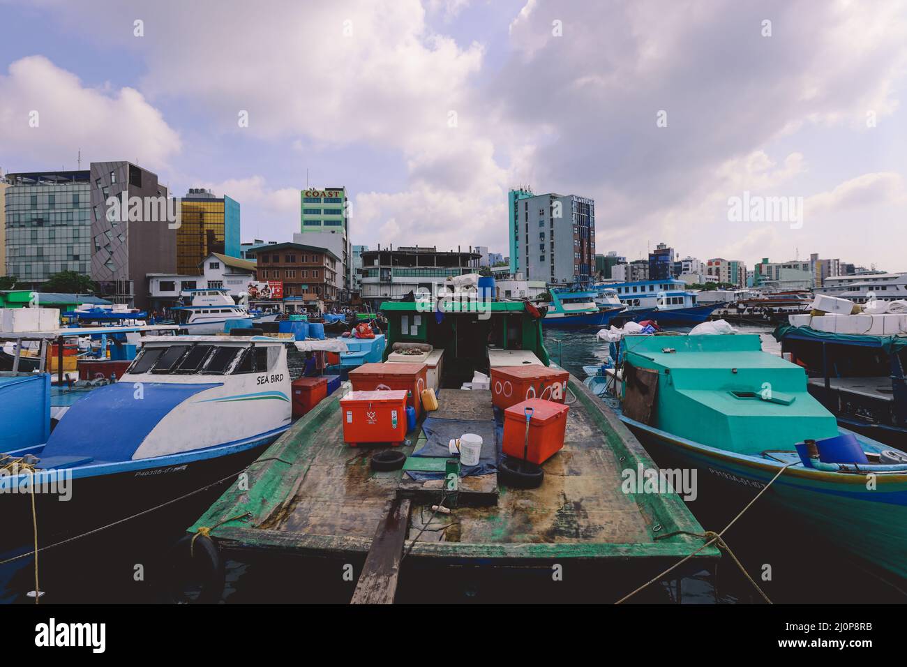 Colorful Boats and Ships in the Maldivian Blue Water Marina of the Male ...