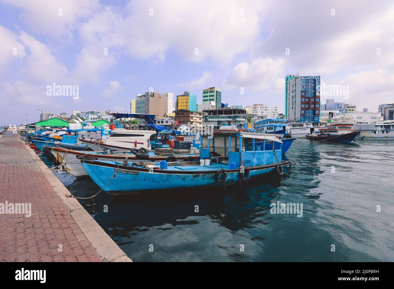 Colorful Boats and Ships in the Maldivian Blue Water Marina of the Male ...