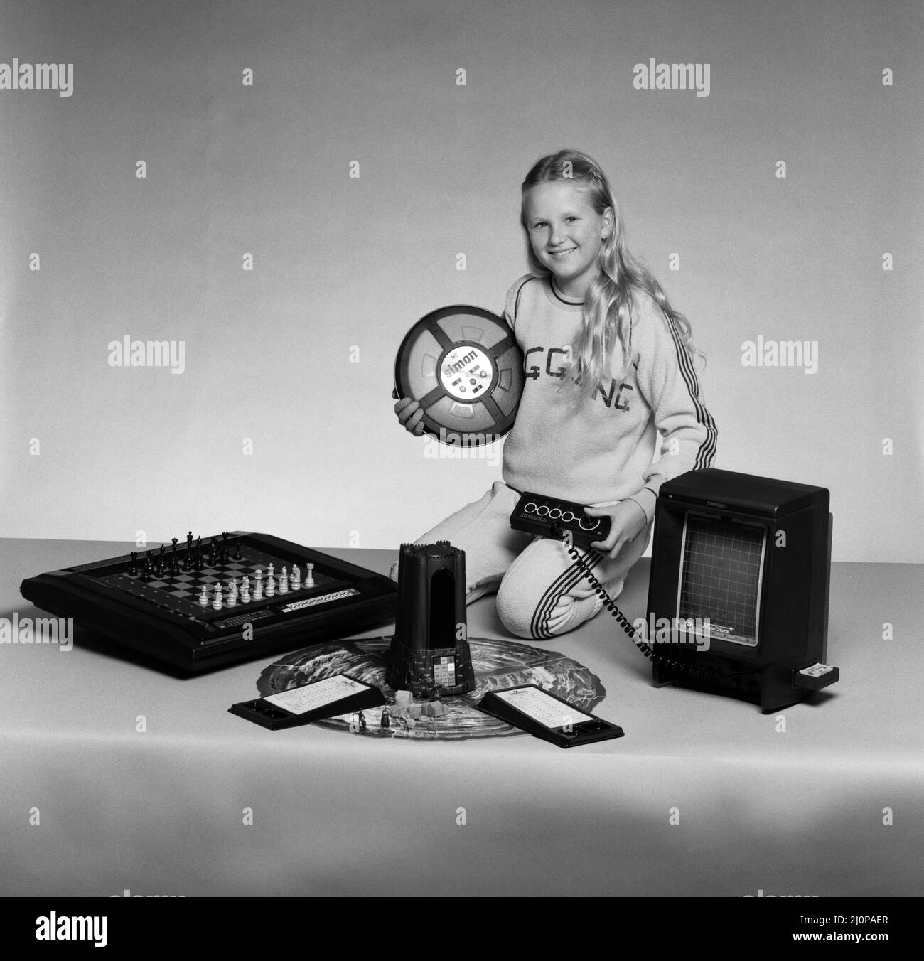 A young girl with a selection of children's toys. 11th November 1983 ...
