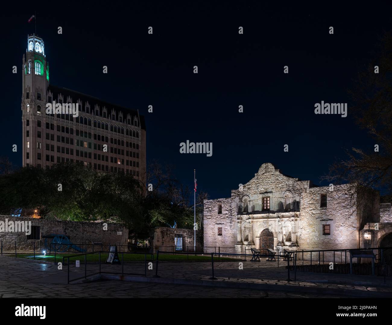 Side View of the San Antonio alamo at Night with Cannon and LArge ...