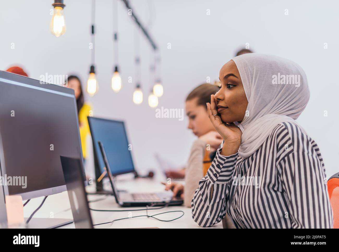 Muslim Woman Female Front Desk High Resolution Stock Photography and ...
