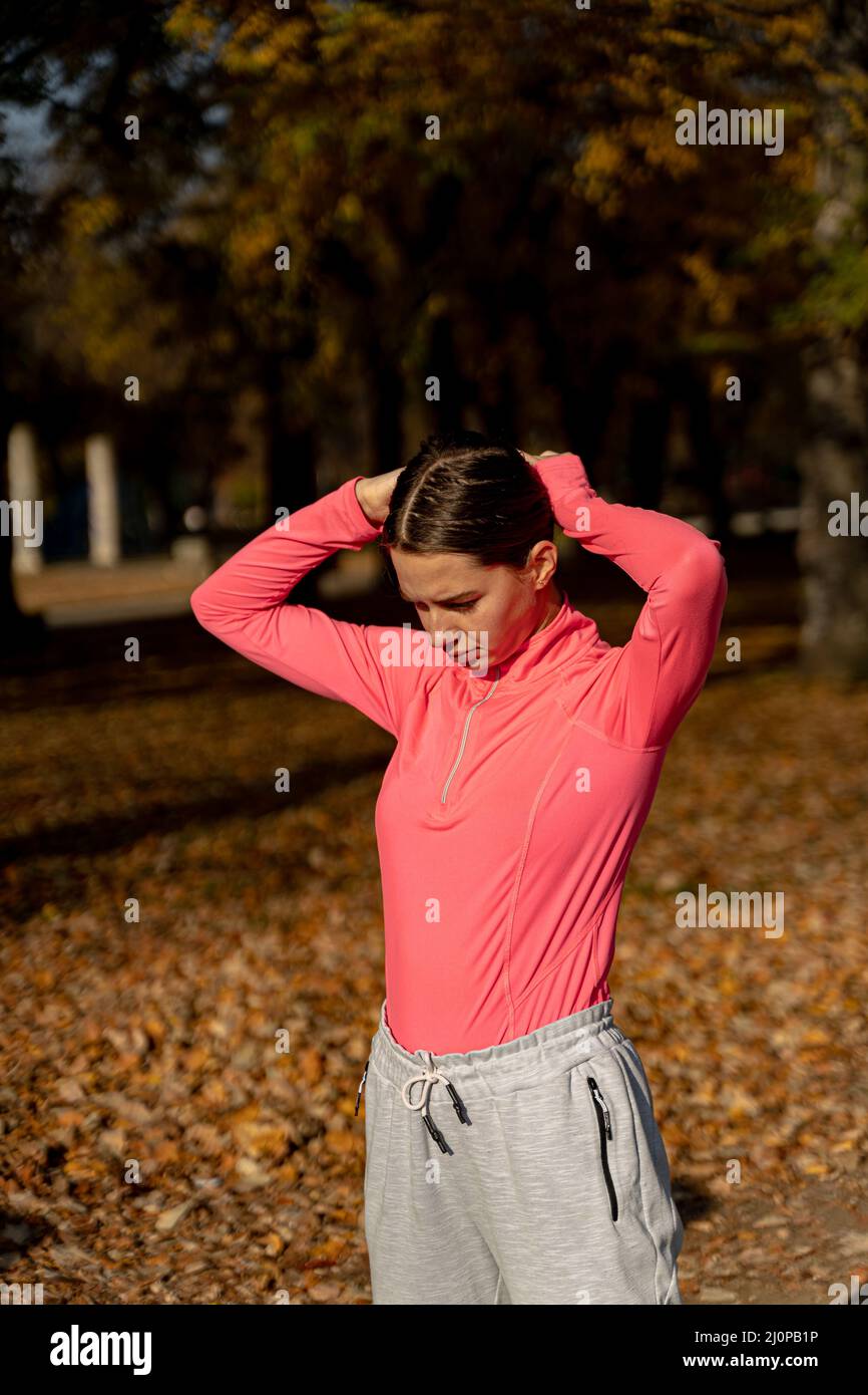 Amazing and attractive girl is getting ready for her training while ...
