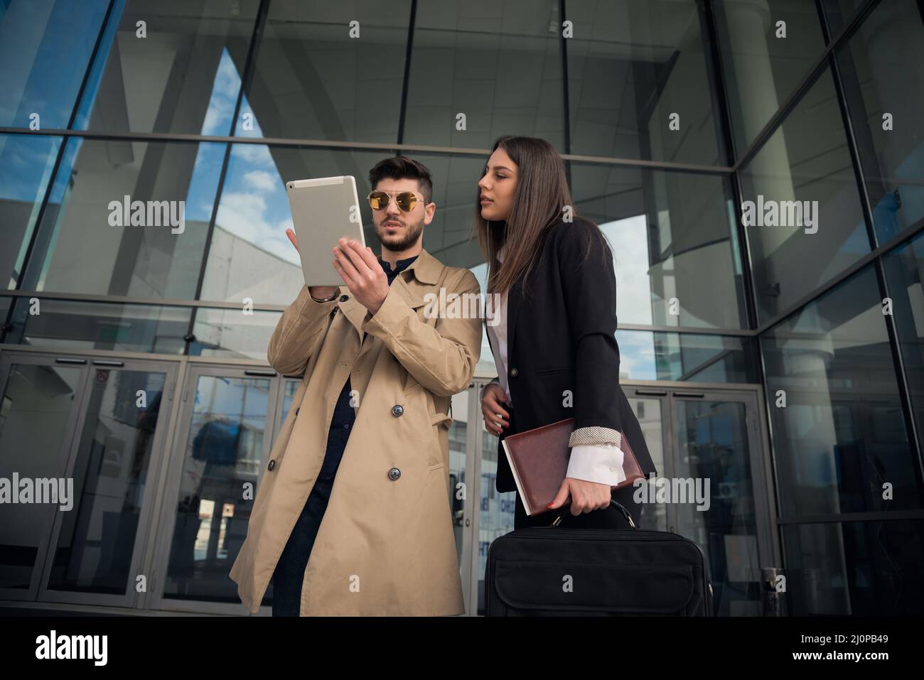 Business people are having a second look at the plan about the company ...