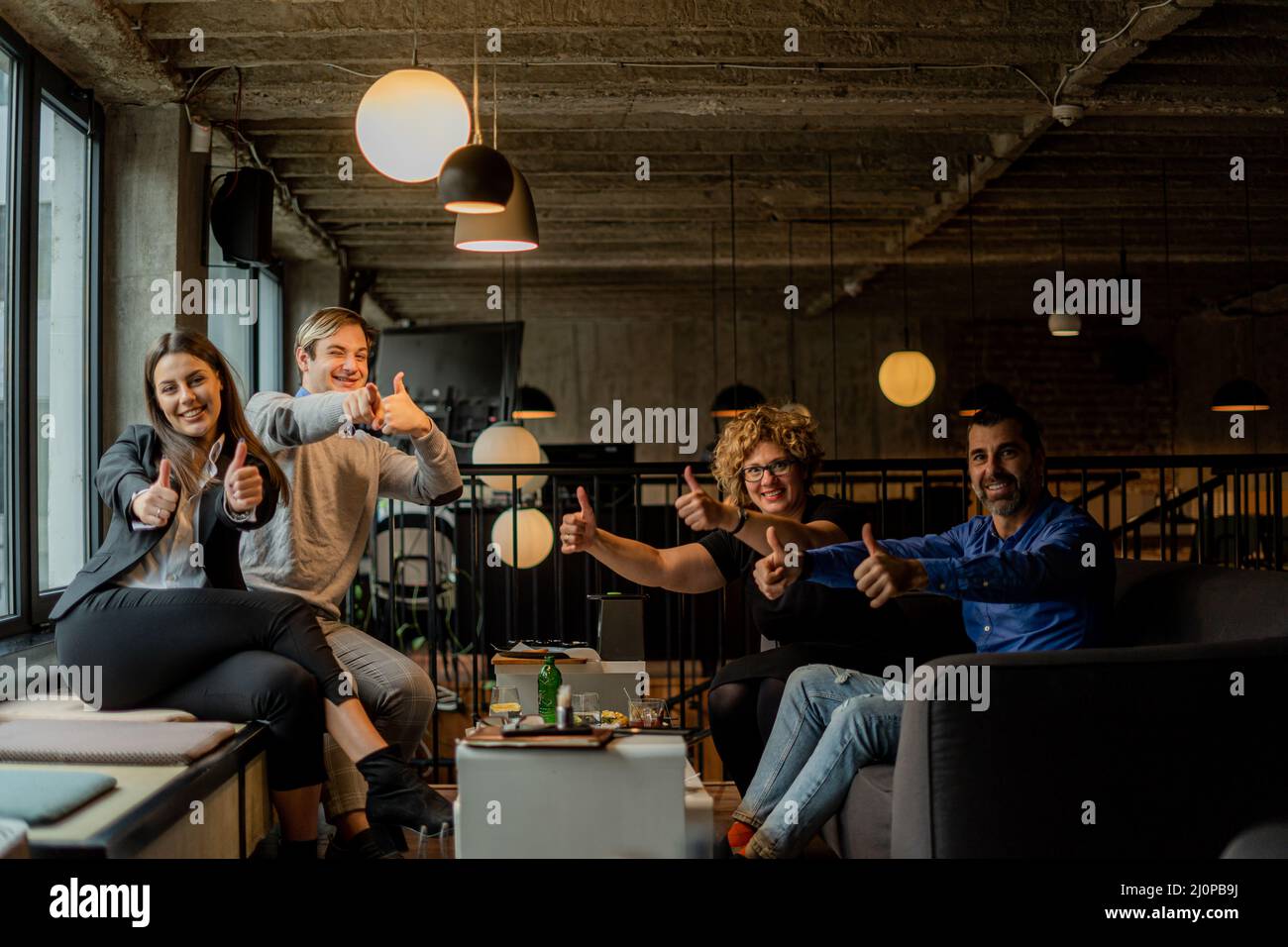 Group of amazing business people are giving likes together Stock Photo ...