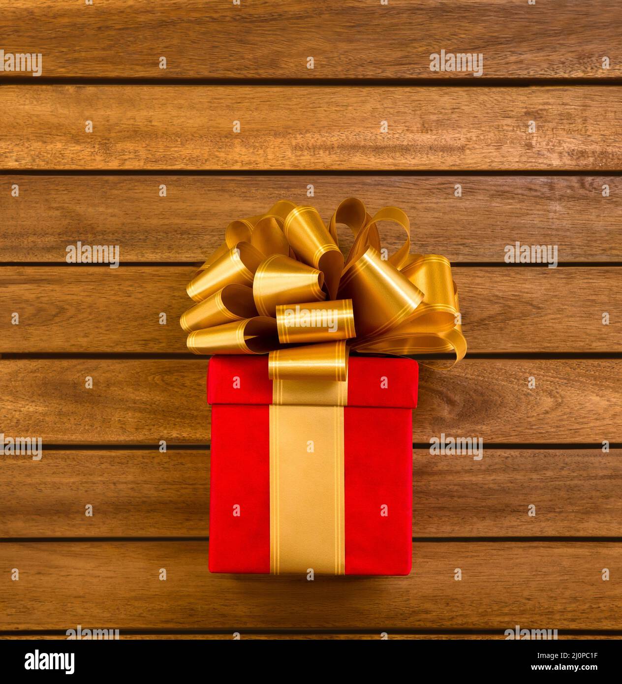 Red Square Gift Box with Gold Ribbon and Big Loopy Bow on it. Copy ...