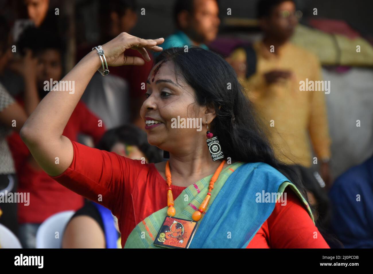 A dancer of Bengali cultural group is performing the springtime dance ...