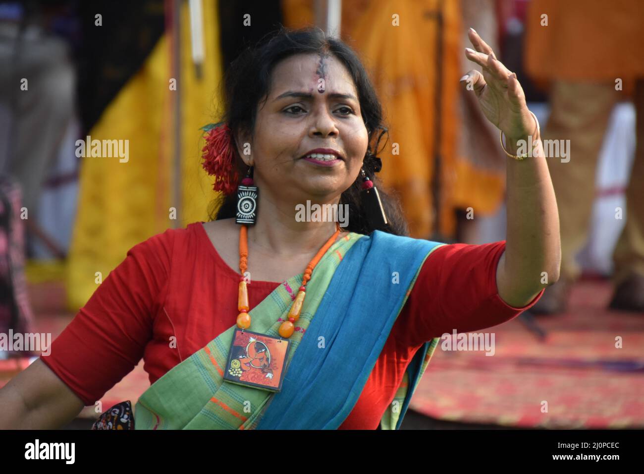 A dancer of Bengali cultural group is performing the springtime dance with poetry and song ahead ...