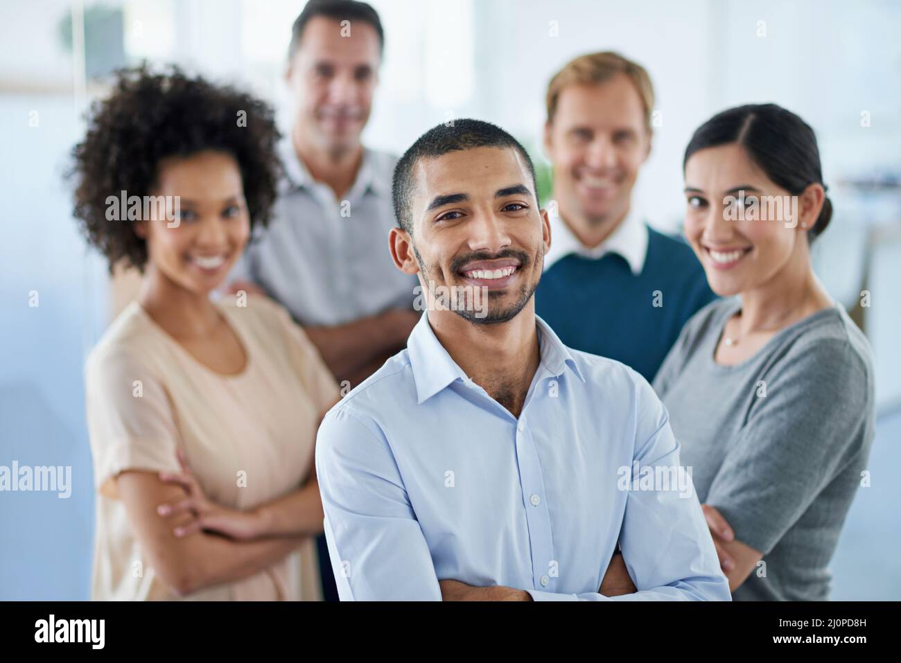 Proud of my teams achievements. Portrait of a group of diverse ...