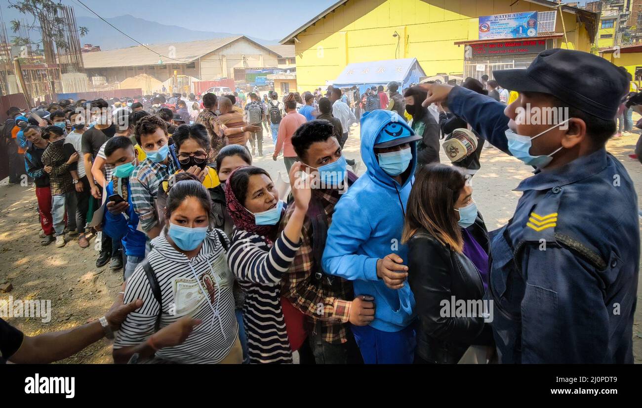 March 20, 2022, Kathmandu, Bagmati, Nepal: Nepali youths queue up to ...