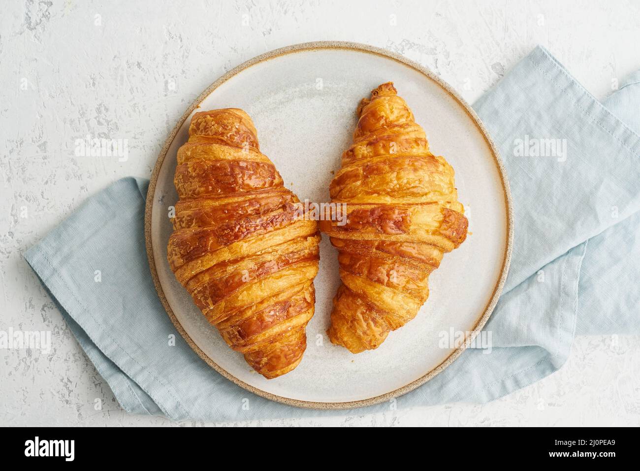Two baked croissants on hi-res stock photography and images - Alamy