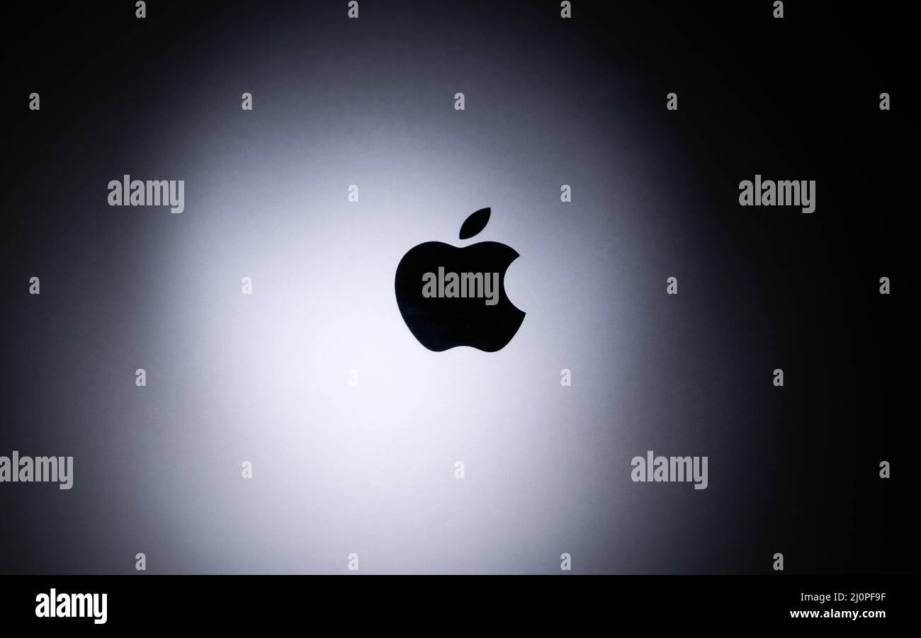 Spain, 03, 20, 2022. Macbook logo on gray metallic aluminium surface ...