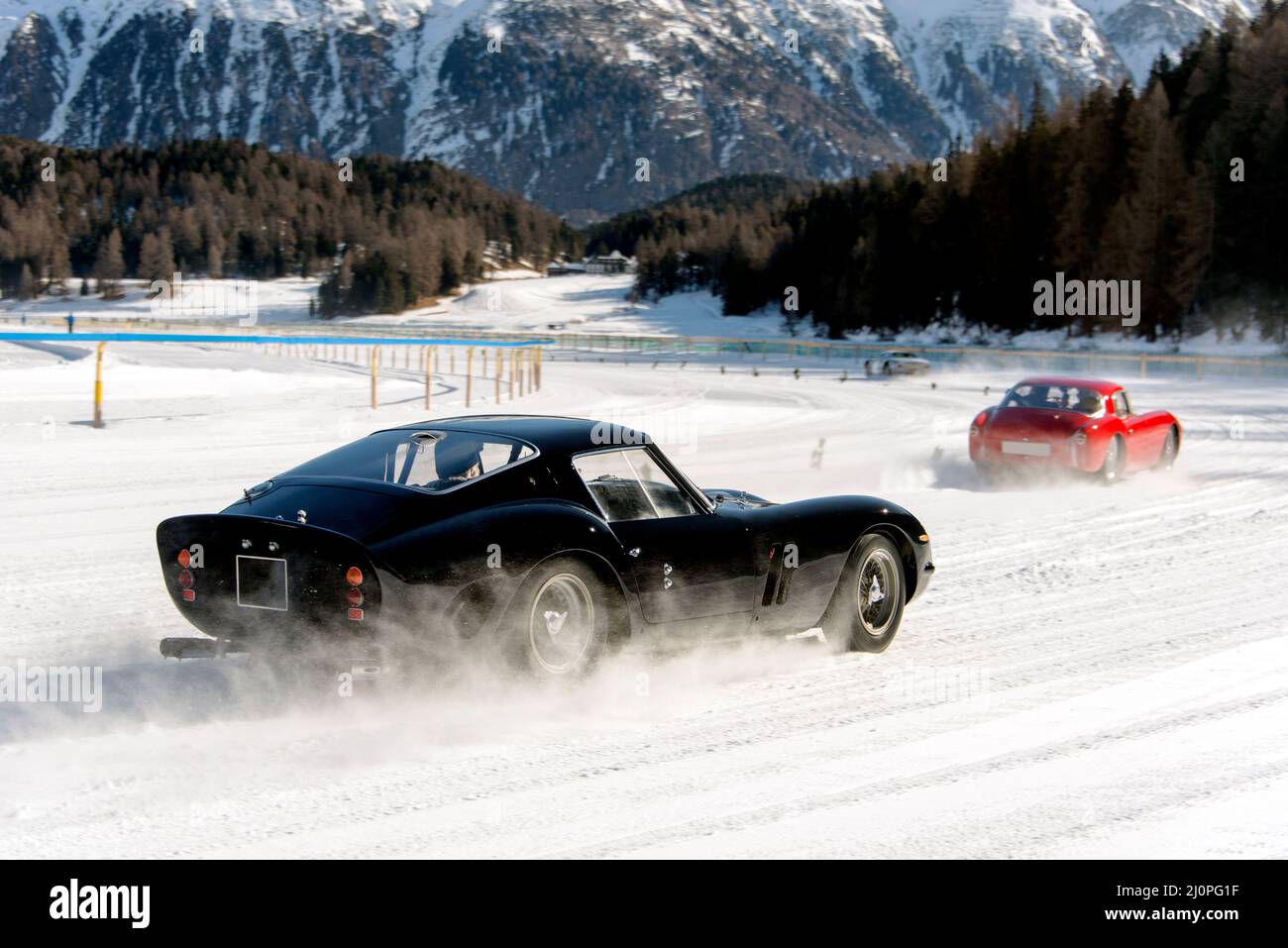 Classic vintage antique sports cars racing on the frozen lake of St ...