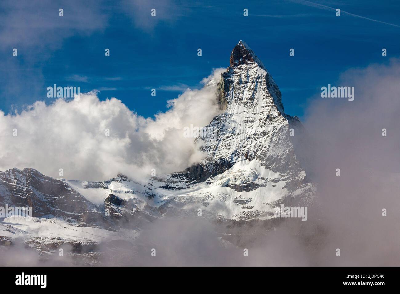 Panorama view of Matterhorn behind the clouds Stock Photo - Alamy
